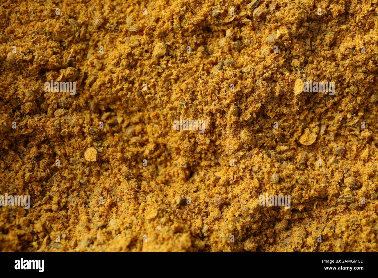 Curry powder spice texture background, close up Stock Photo - Alamy