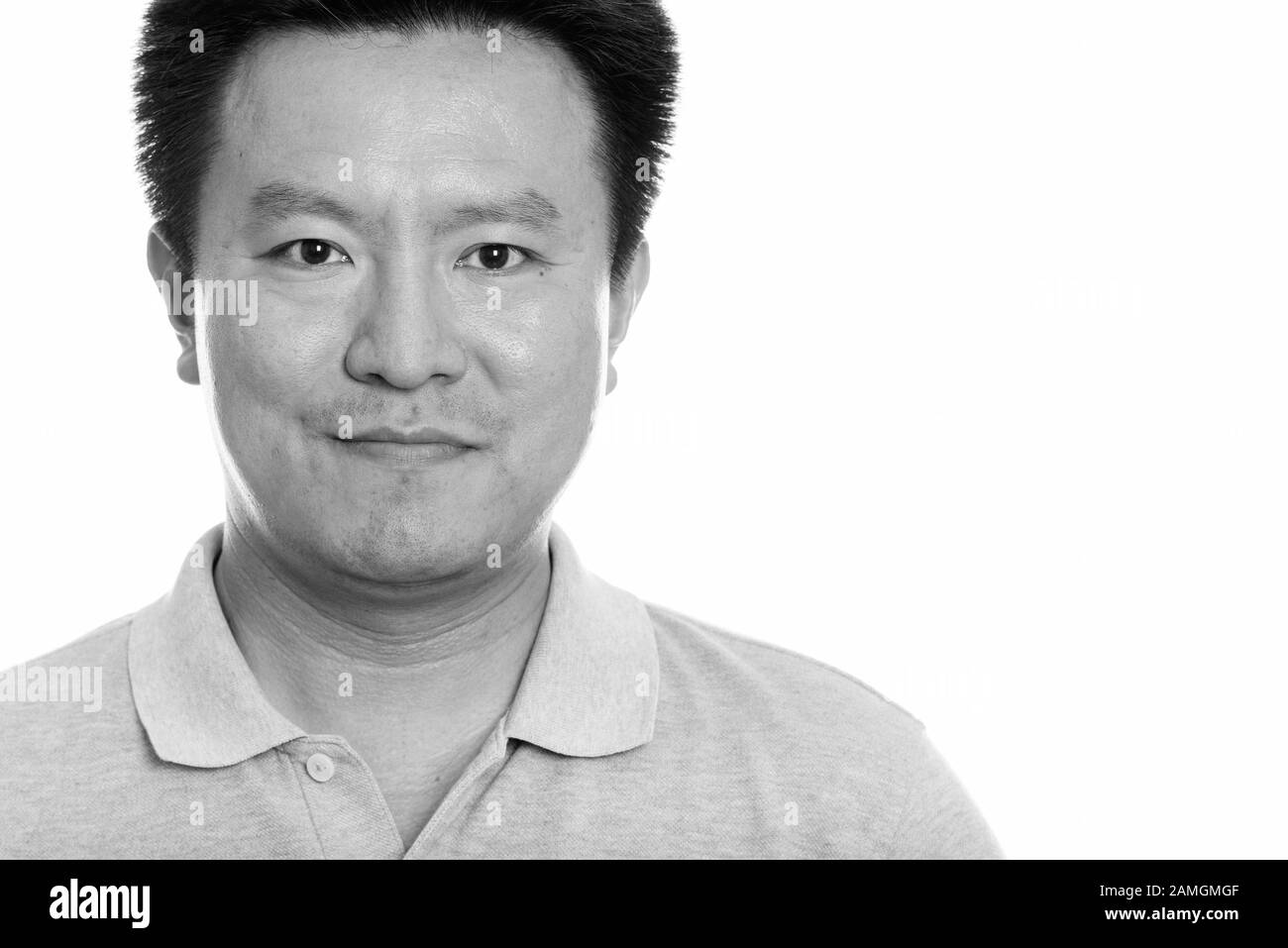 Close up of Japanese man looking at camera Stock Photo - Alamy