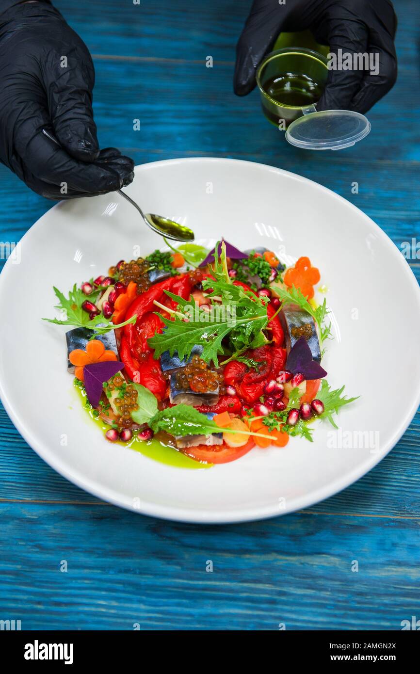 Escabeche fish dish with caviar Stock Photo - Alamy