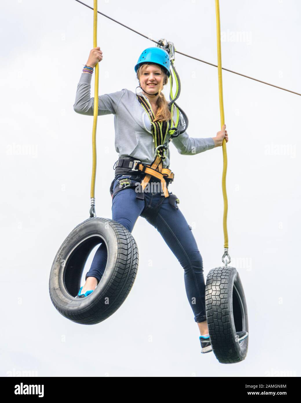 Funny afternoon in high ropes course Stock Photo - Alamy