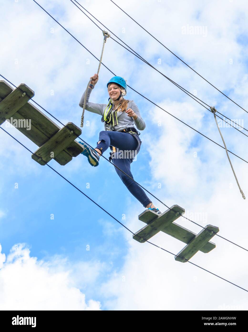Funny afternoon in high ropes course Stock Photo - Alamy