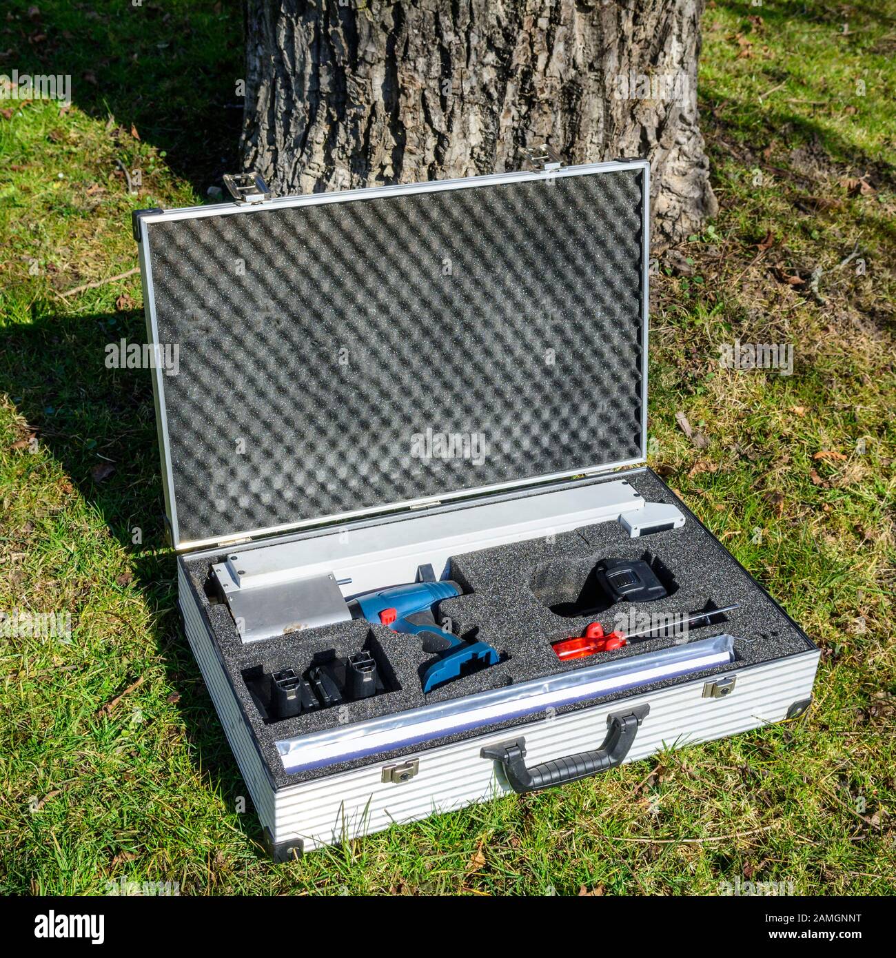 Technical equipment of treeworkers for testing inner life of a tree ...