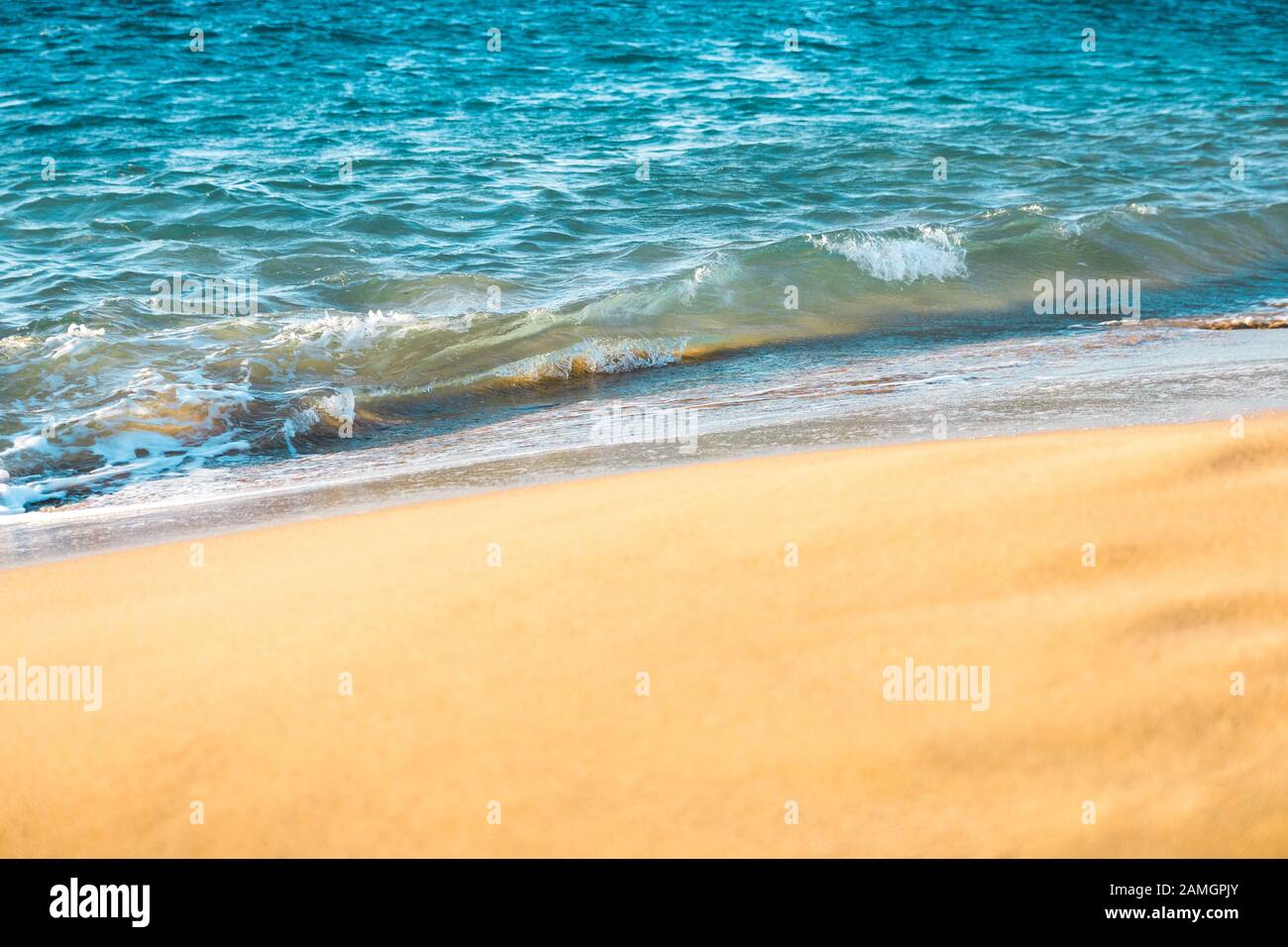close up blue sea water coming on the clean beach sand Stock Photo - Alamy