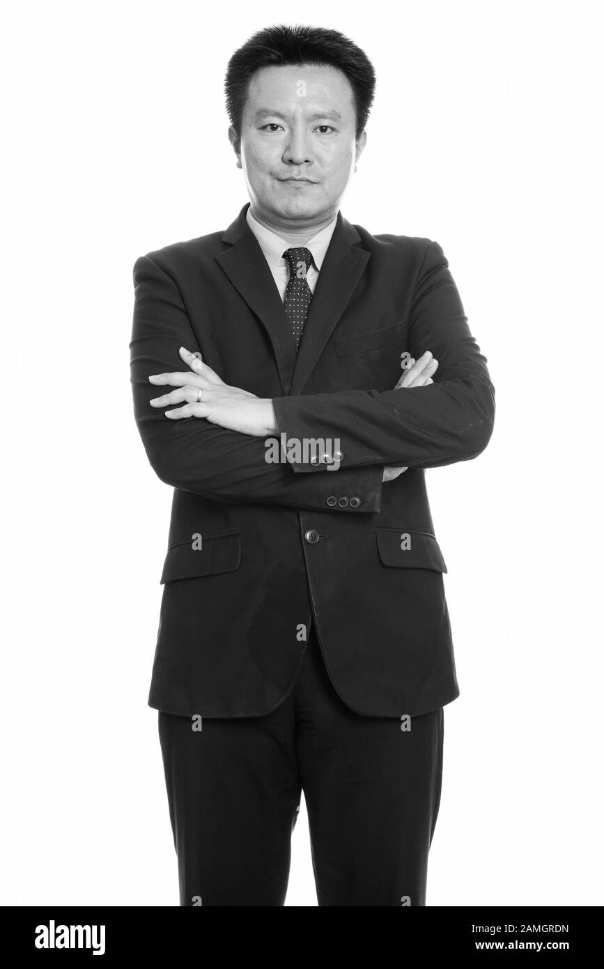 Studio shot mature businessman arms Black and White Stock Photos ...