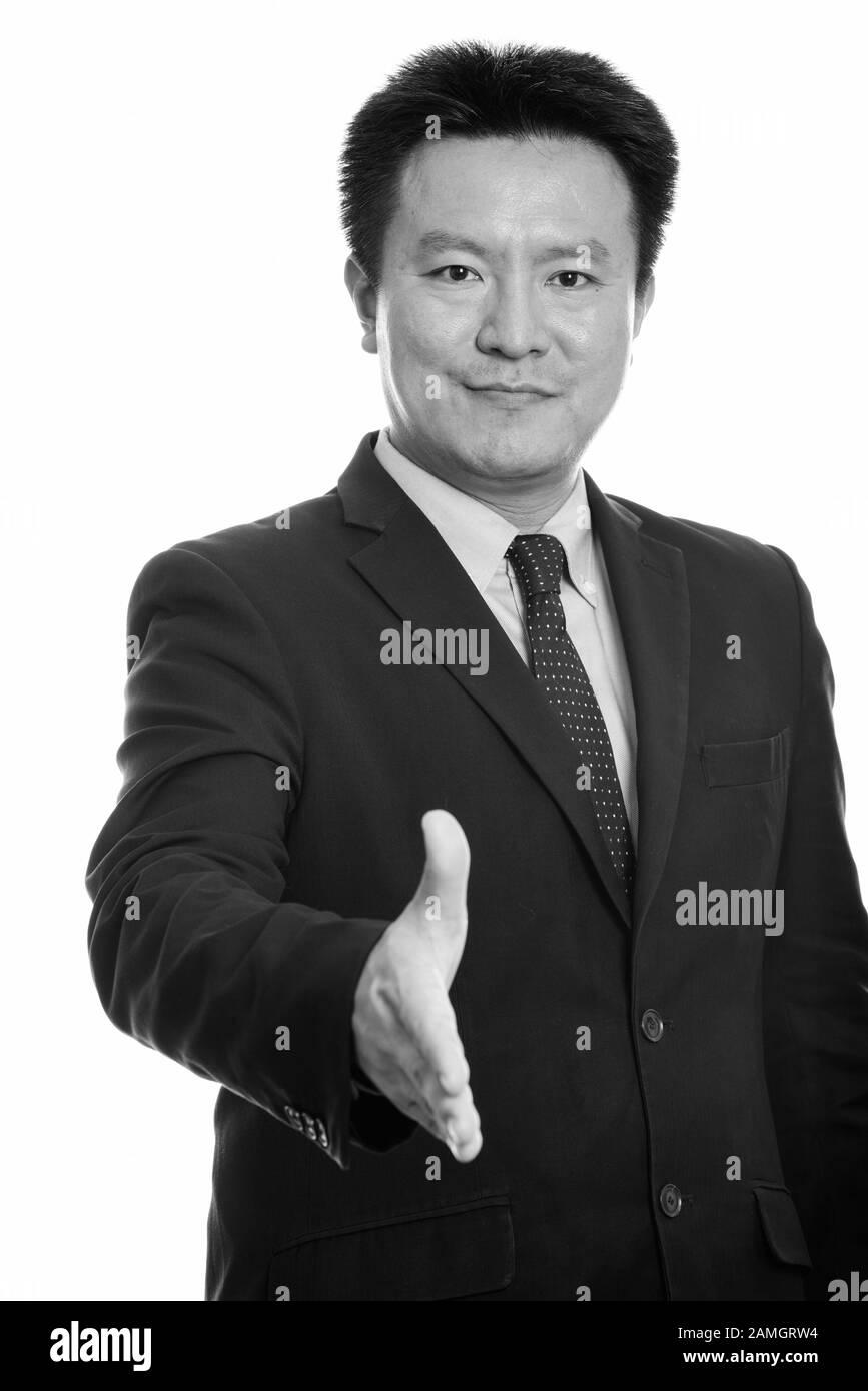 Asian greeting handshake Black and White Stock Photos & Images - Alamy