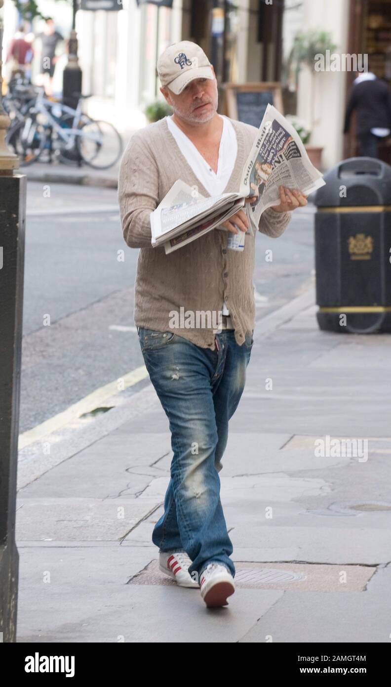 Gary Goldsmith uncle to Kate Middleton at his home in London, carrying ...