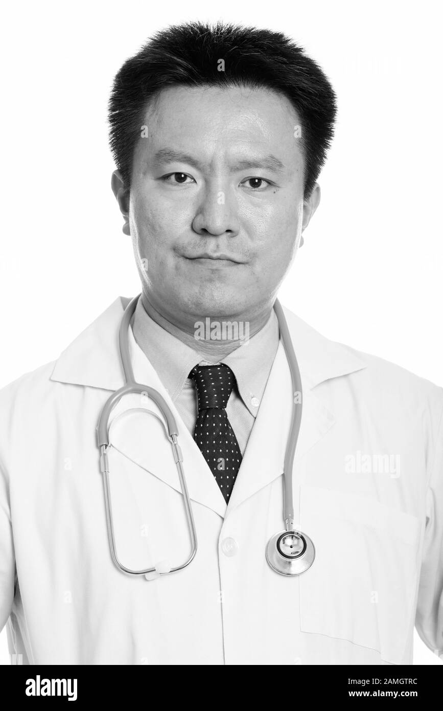 Face of Japanese man doctor looking at camera Stock Photo - Alamy