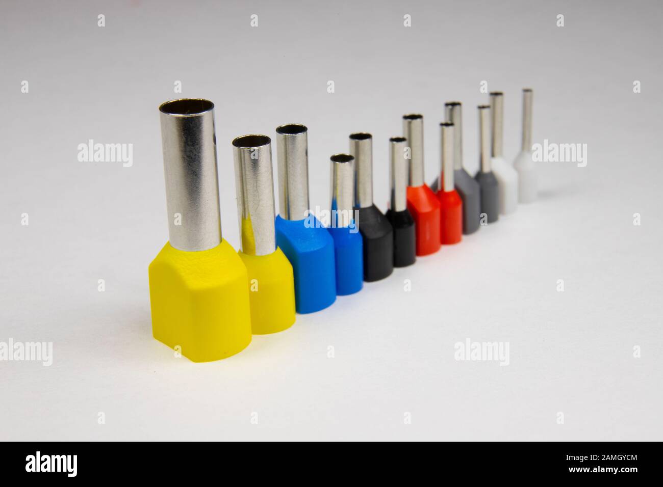 Multicolored metal-plastic tips for crimping stranded electrical wires ...