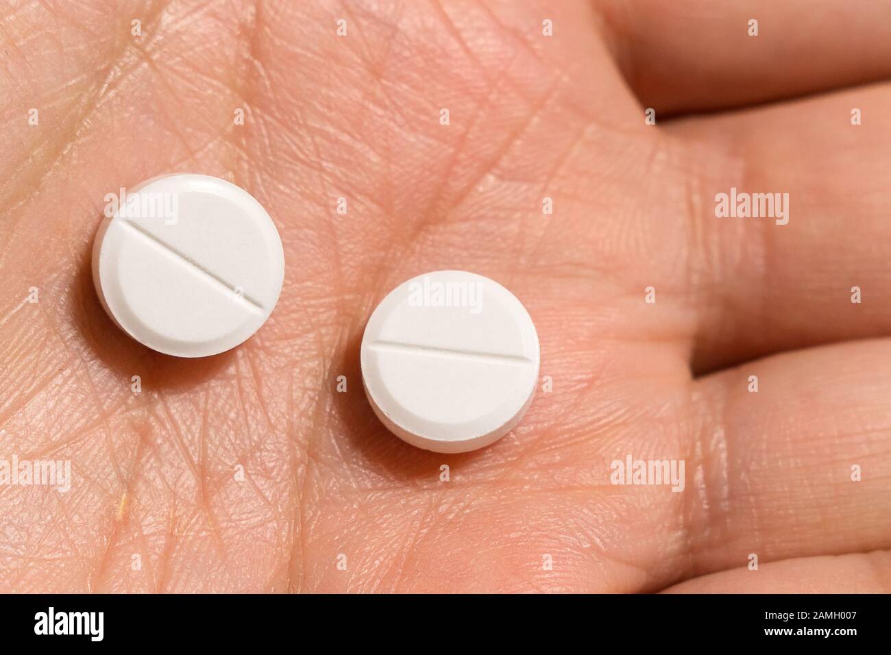close-up pills in hand, medicine, aspirin medication Stock Photo - Alamy