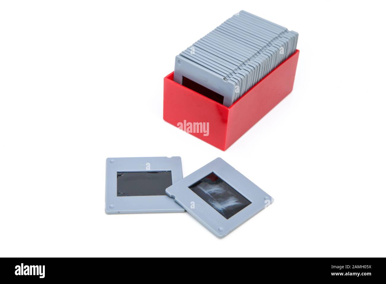 The transparent slides lying in front of the box with the other ones ...