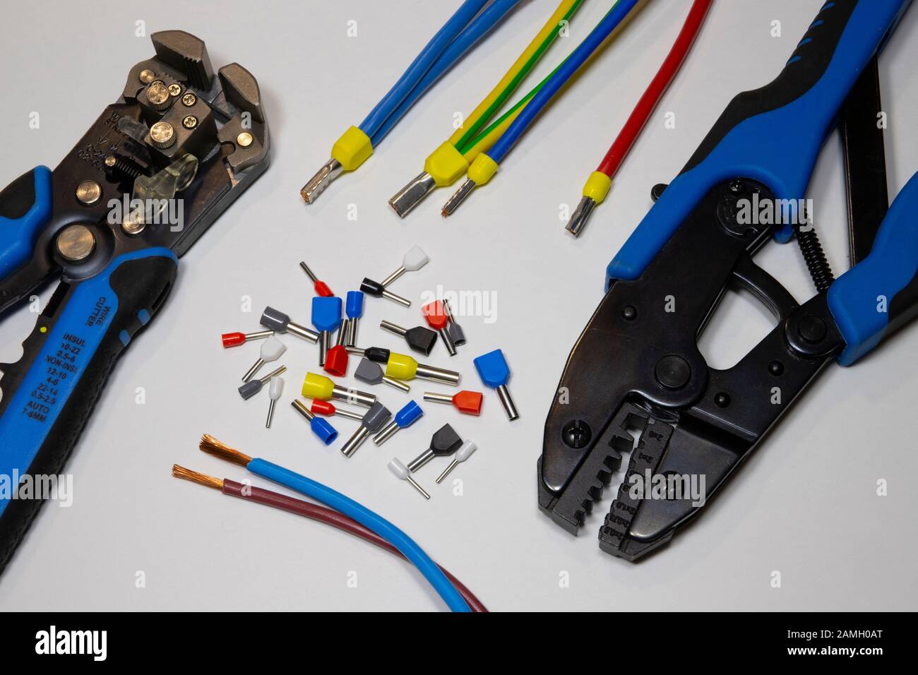 Tools and materials for stripping and crimping Stock Photo - Alamy