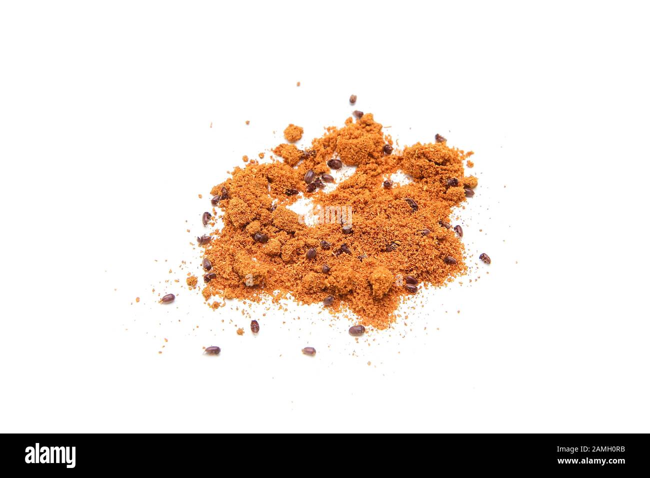 The red curry powder infested with food beetles. A detail od the ...