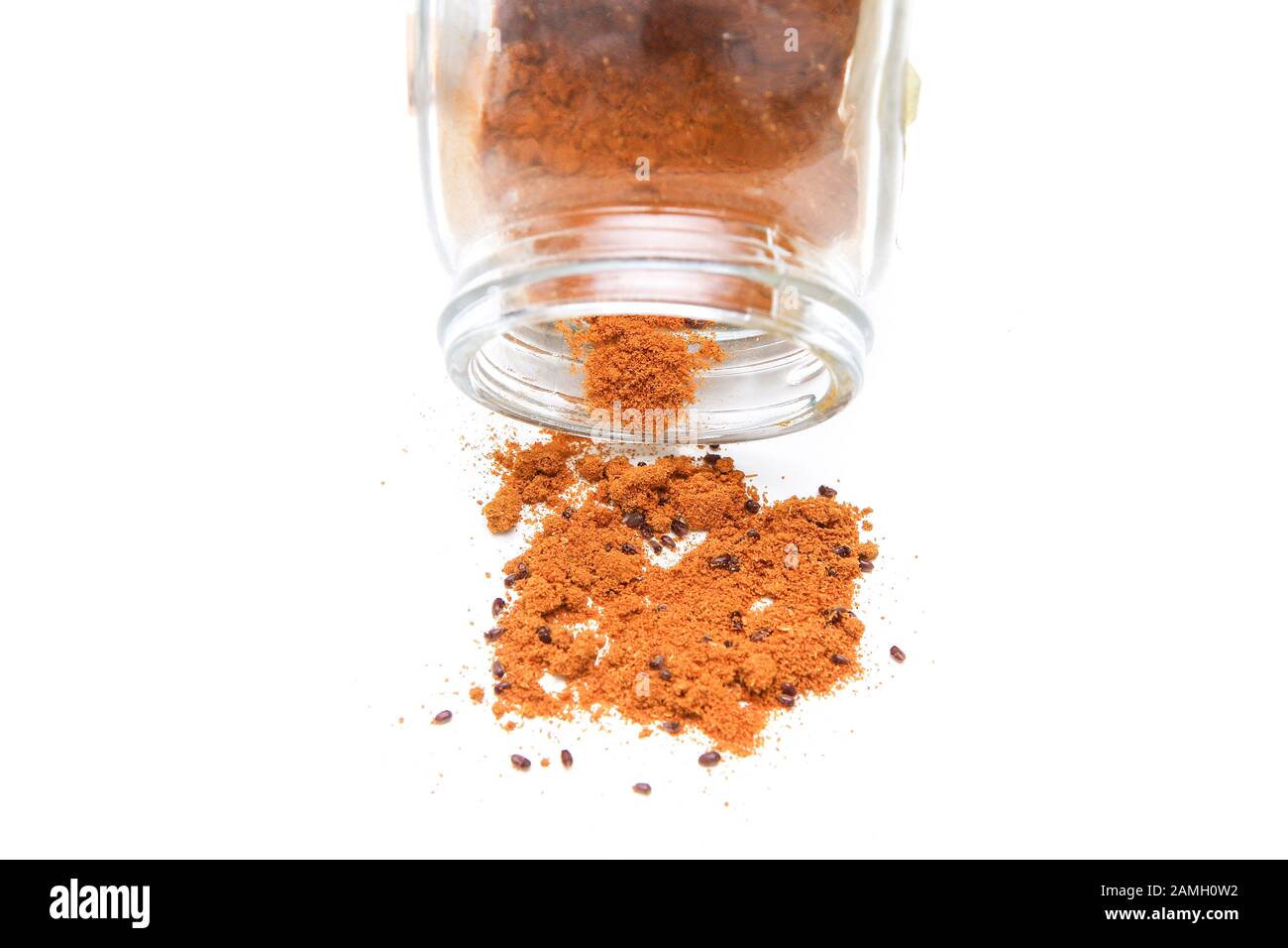 The red curry powder infested with food beetles. A detail od the ...