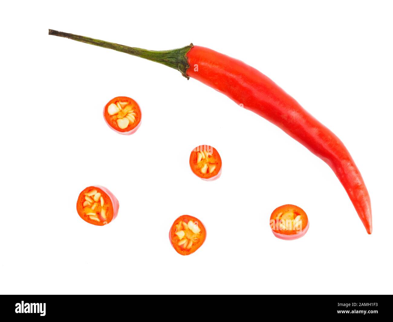 Red chili pod and sliced pieces on white isolated background. Indian ...