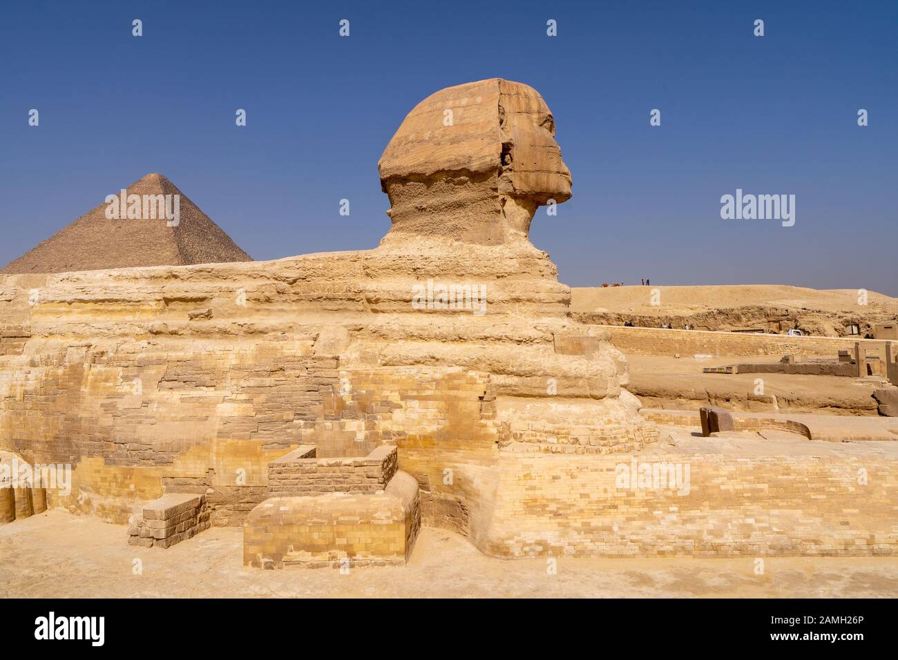 Great Sphinx of Giza, with the Great Pyramid in the background Stock ...