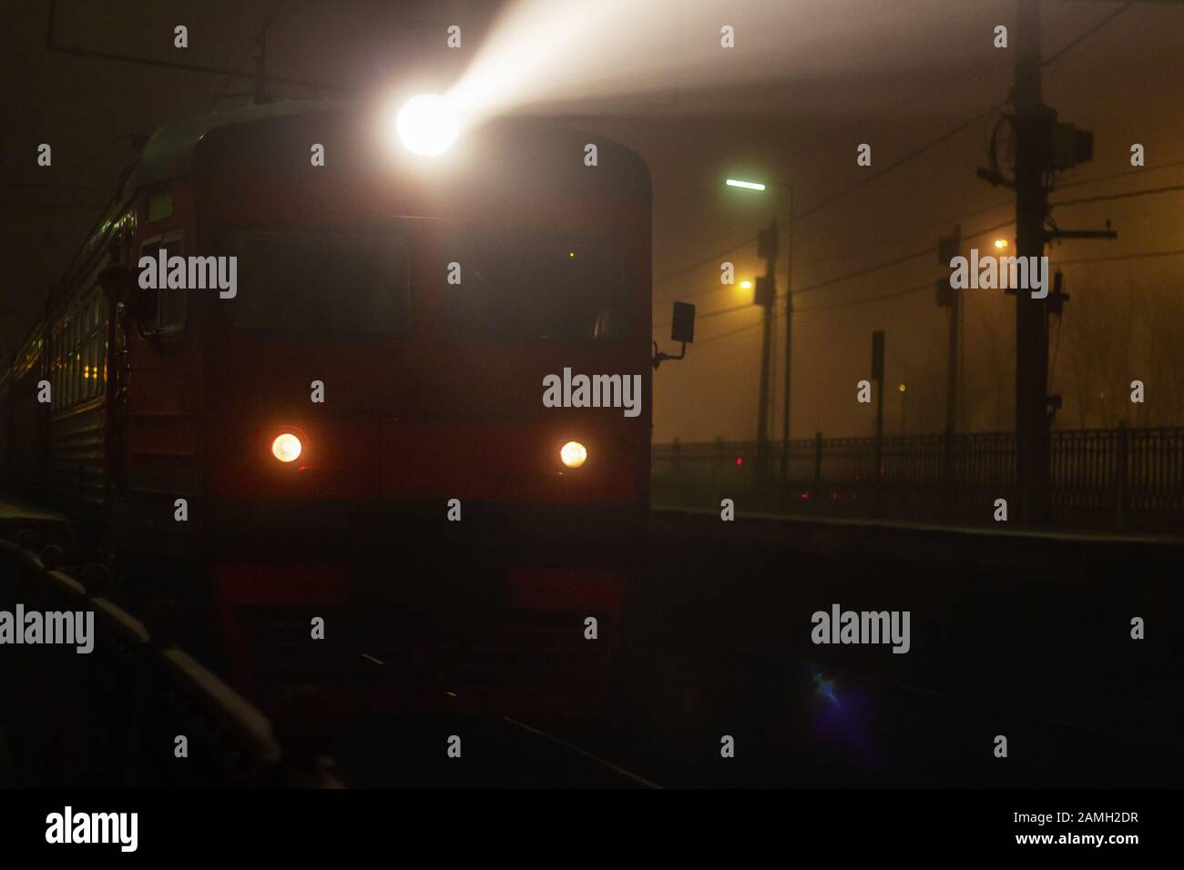 night train railway lights through the fog Stock Photo - Alamy