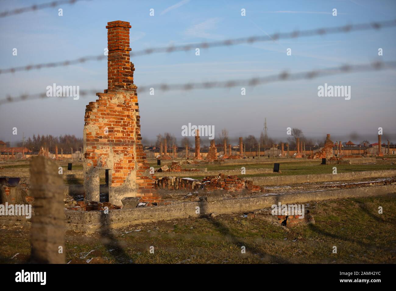 Auschwitz- Birkenau, Poland- electric fence with barbed wire, destroyed ...