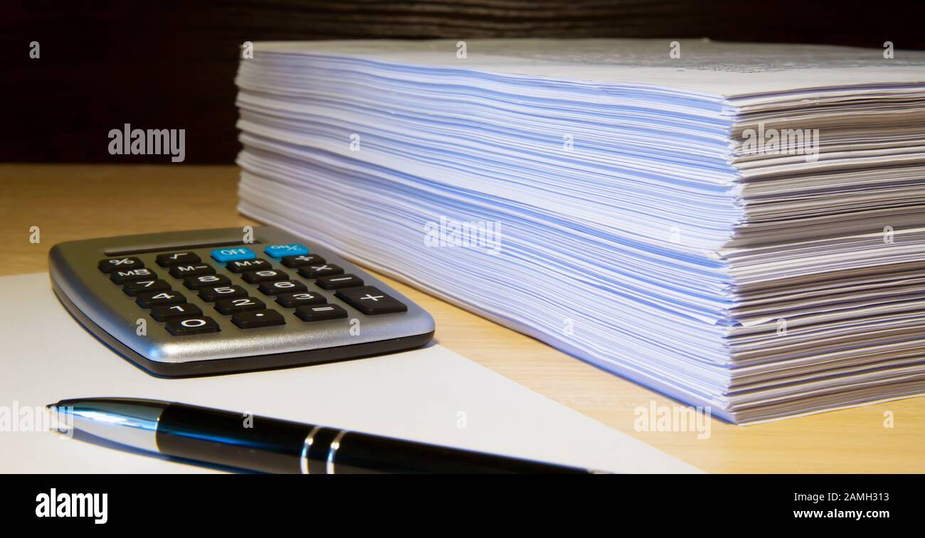 Pile of papers on desk hi-res stock photography and images - Alamy