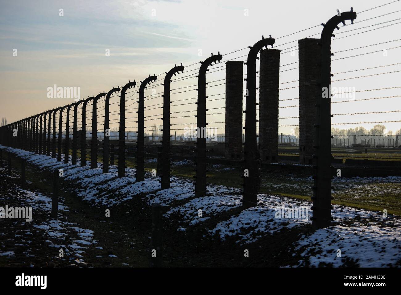 Auschwitz- Birkenau, Poland - 6 Decemeber 2019: electric fence with ...
