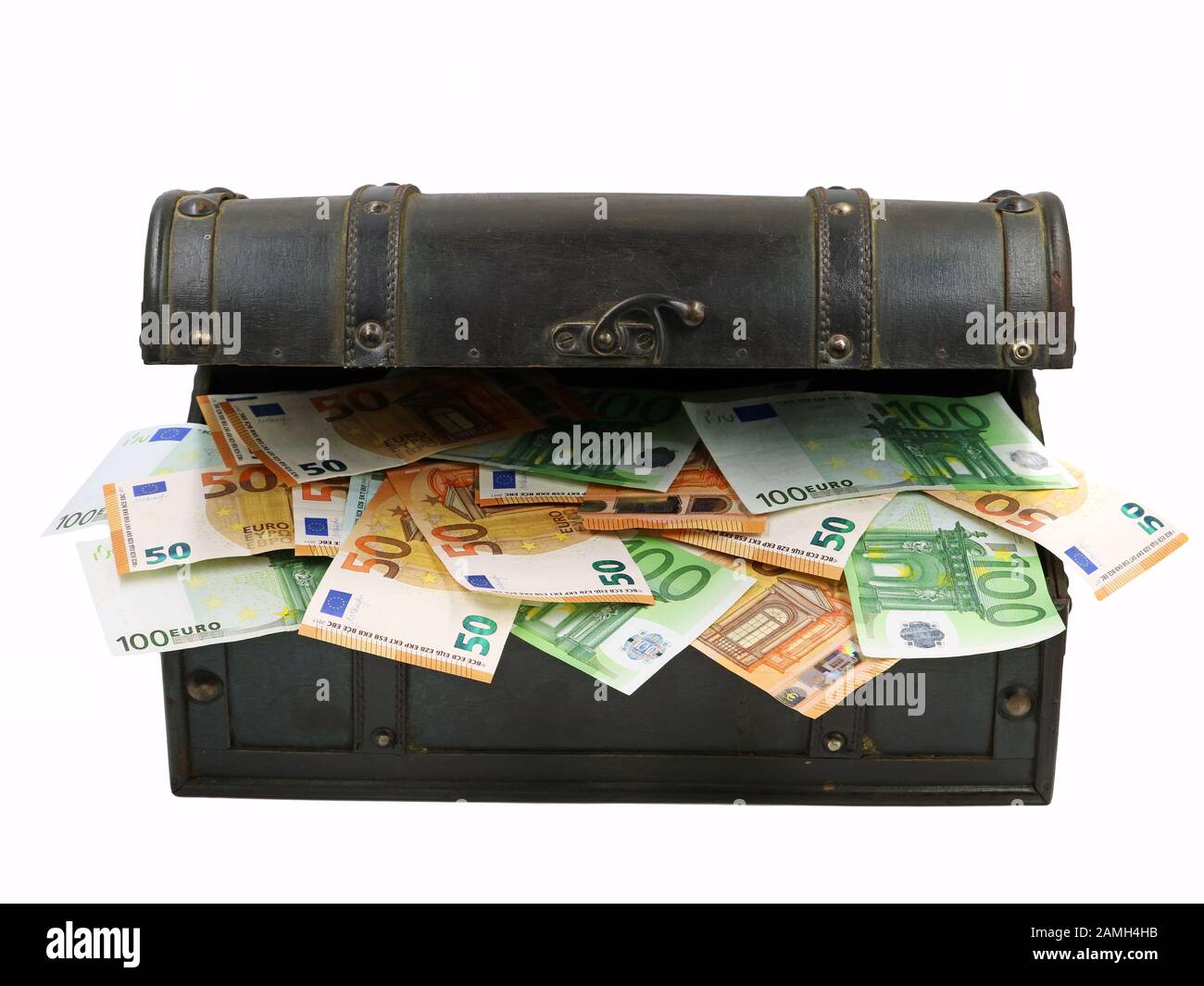 euro banknotes in old open wooden chest isolated on white background ...