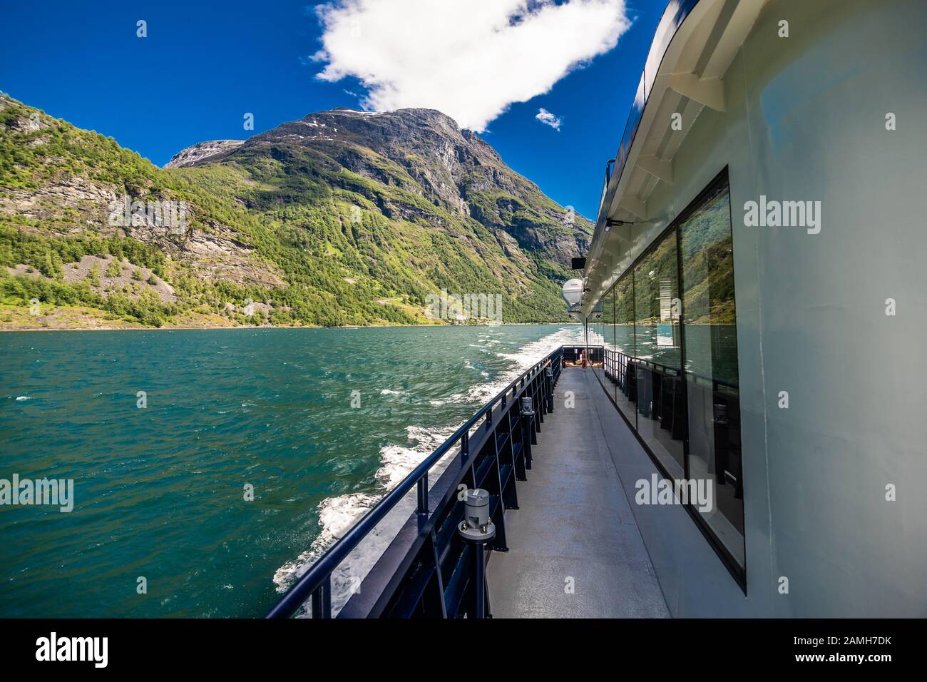 Geiranger, Norway - June, 2019: Hurtigruten cruise liner sailing on the ...