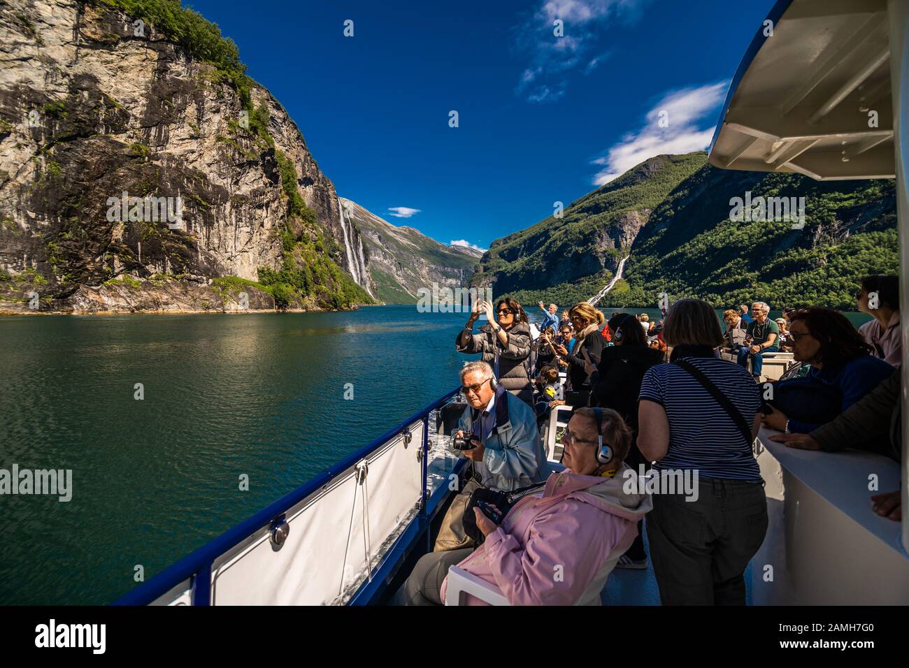 Geiranger, Norway - June, 2019: Hurtigruten cruise liner sailing on the ...