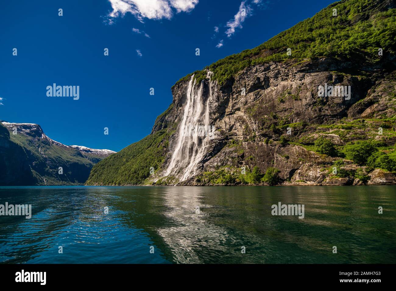 The seven sisters waterfall over Geirangerfjord, located near the ...
