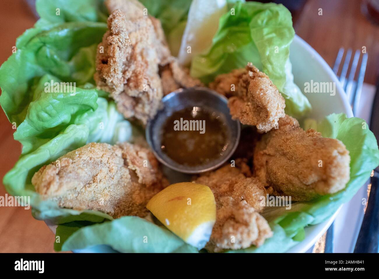 Close-up of traditional American South dish of fried oysters at ...