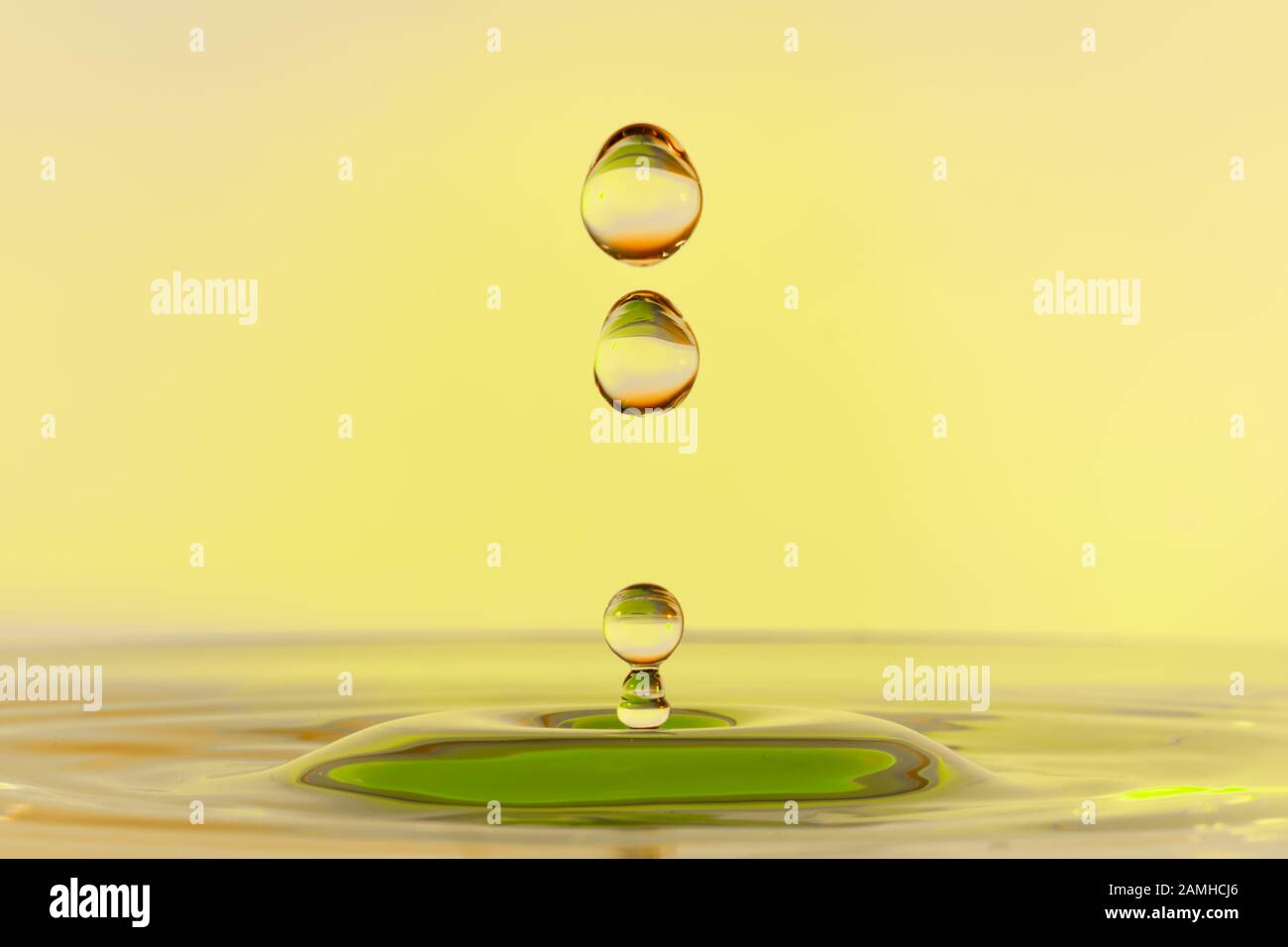 High speed water drop photograph with falling drops Stock Photo - Alamy