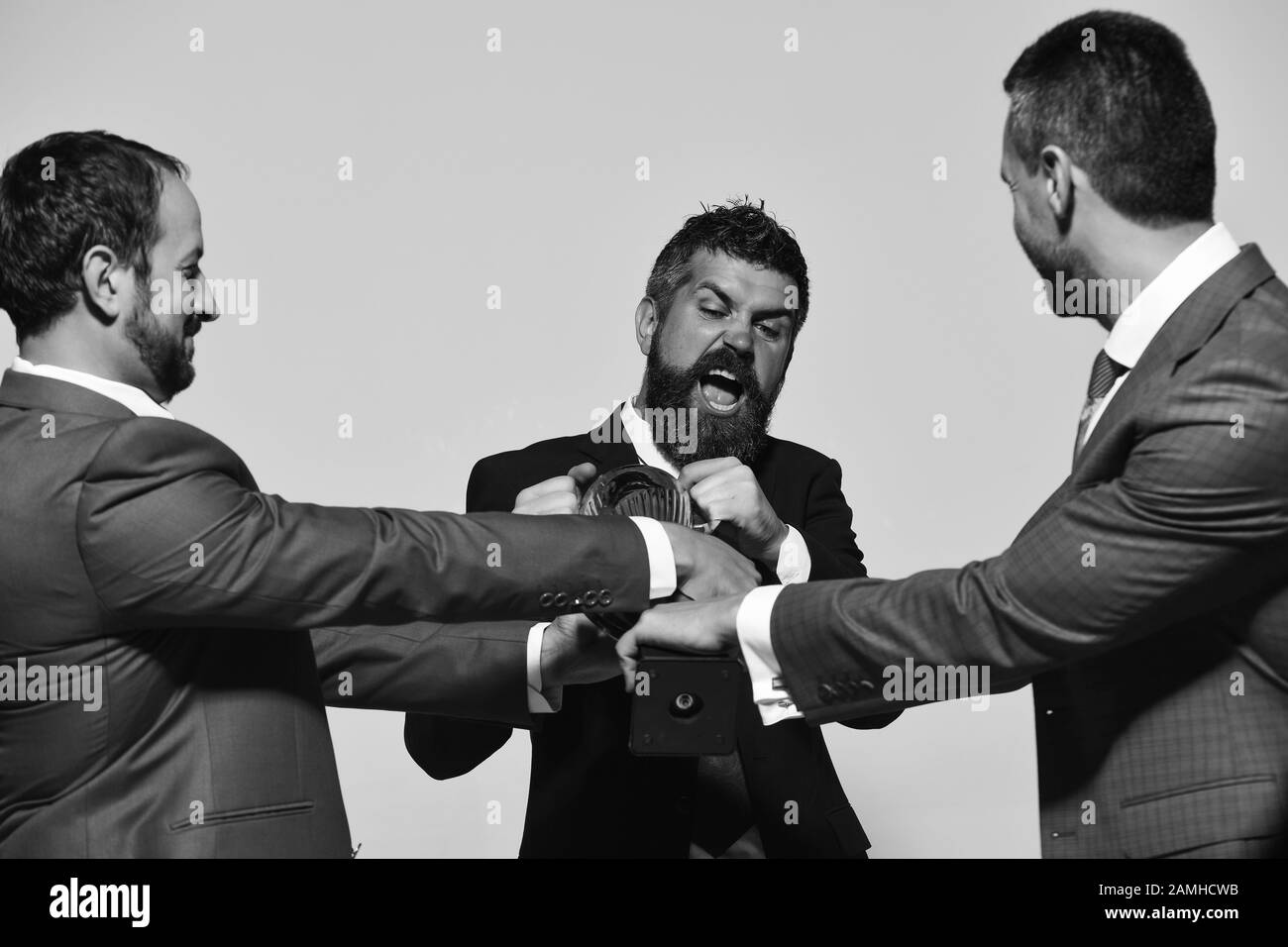 Coworkers or partners fight for winning competition. Company leaders ...