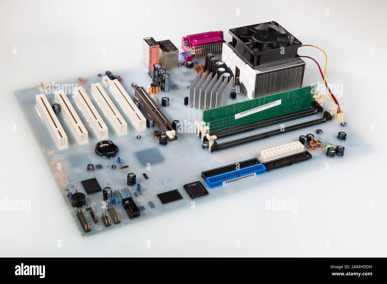 Mainboard card computer flooded by white colored water Stock Photo - Alamy