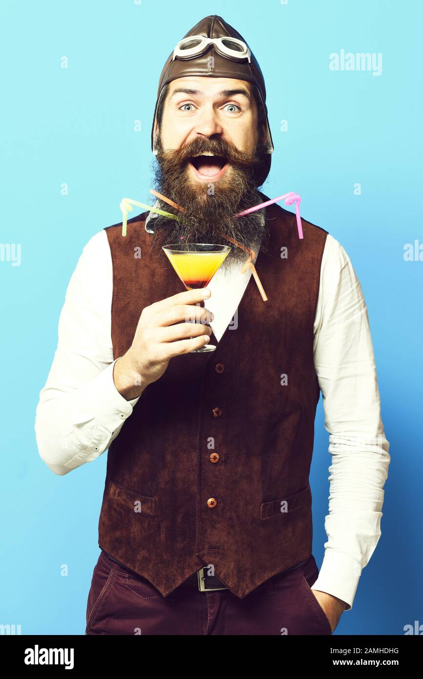 handsome bearded pilot or aviator man with long beard and mustache on ...