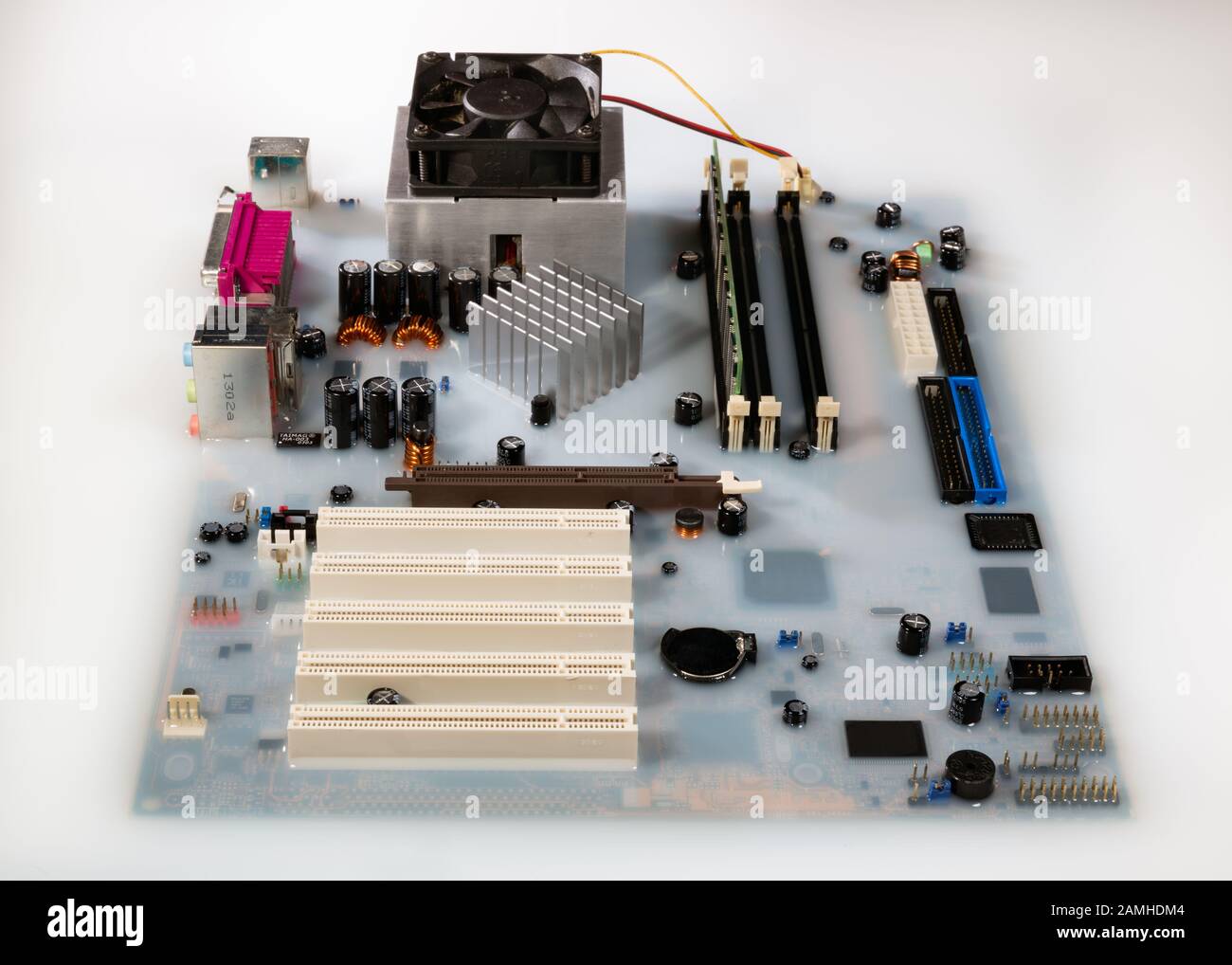 Mainboard card computer flooded by white colored water Stock Photo - Alamy
