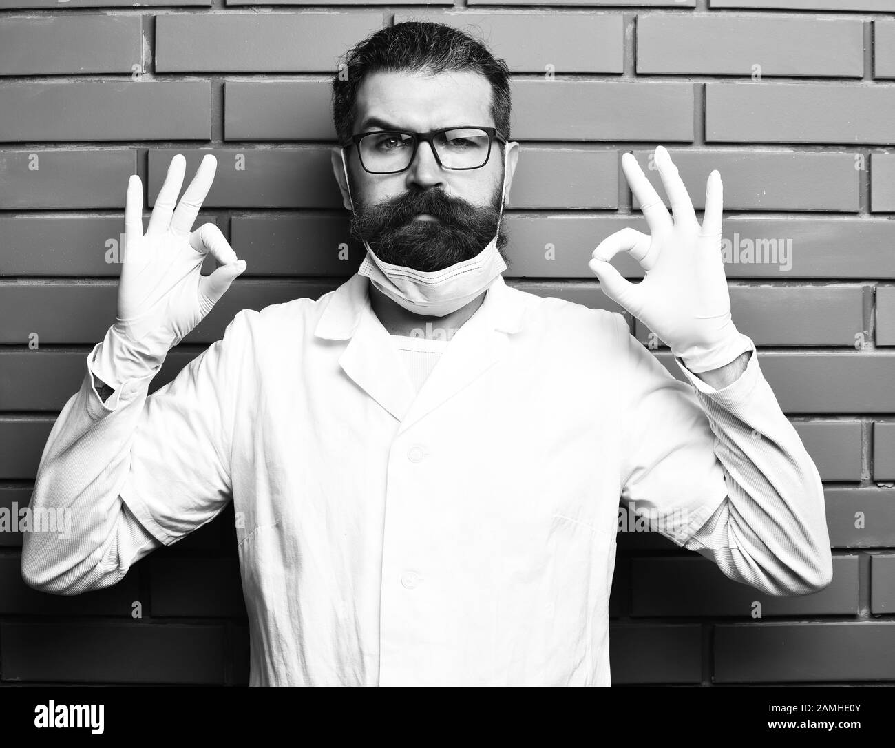 Bearded man, long beard. Brutal caucasian doctor or unshaven hipster ...