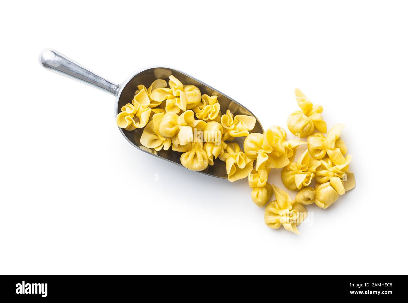 Italian stuffed pasta in scoop. Sacchettini pasta isolated on white ...