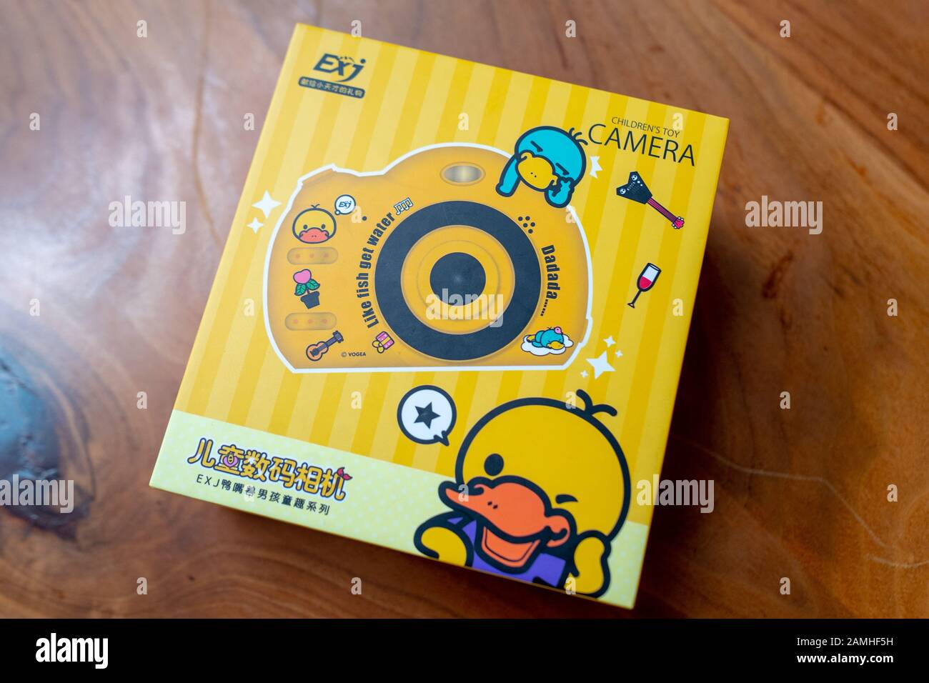 Close-up of box for kid's yellow plastic digital camera from China, a ...
