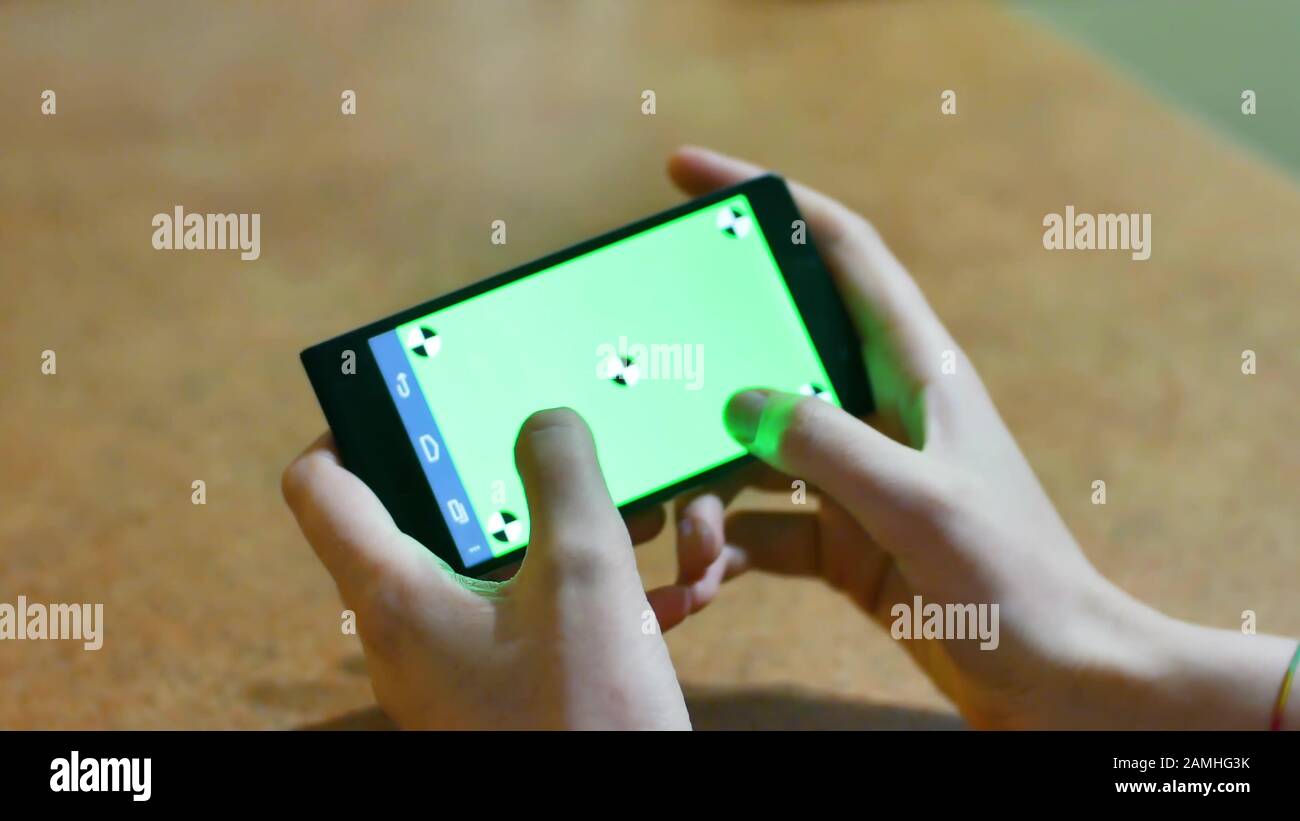 Womans Hands Using A Smart Phone Touchscreen Chroma Key Close Up