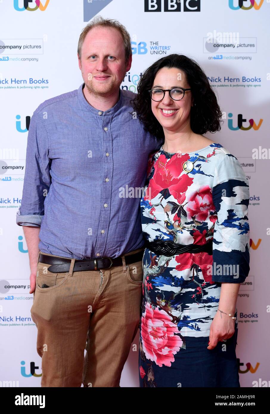 John Ingold (left) arrives at The Writers' Guild Awards 2020 held at ...