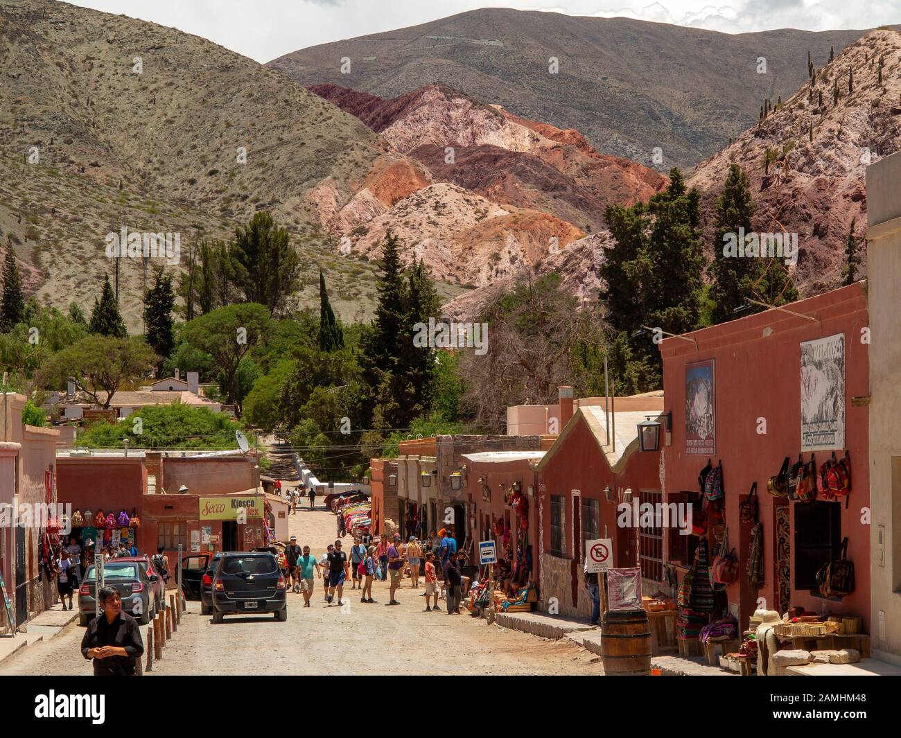 Street scene at Purmamarca town, with the Seven Colors Hills in the ...