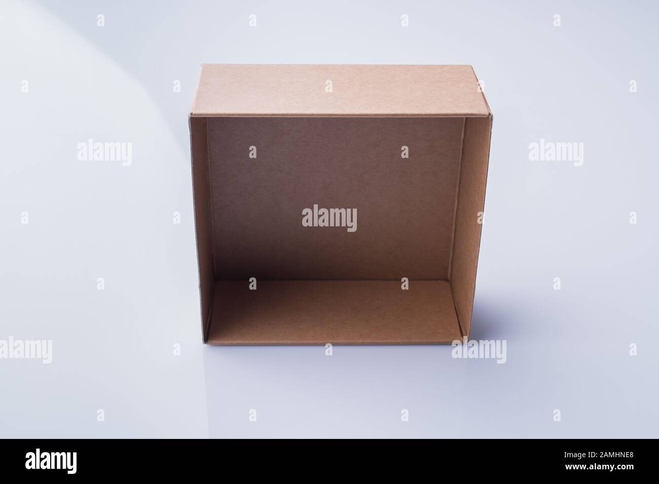 Empty small cardboard box Stock Photo - Alamy