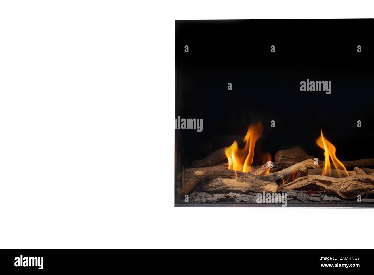 Detail shot of a modern new white gas fireplace with empty white wall ...