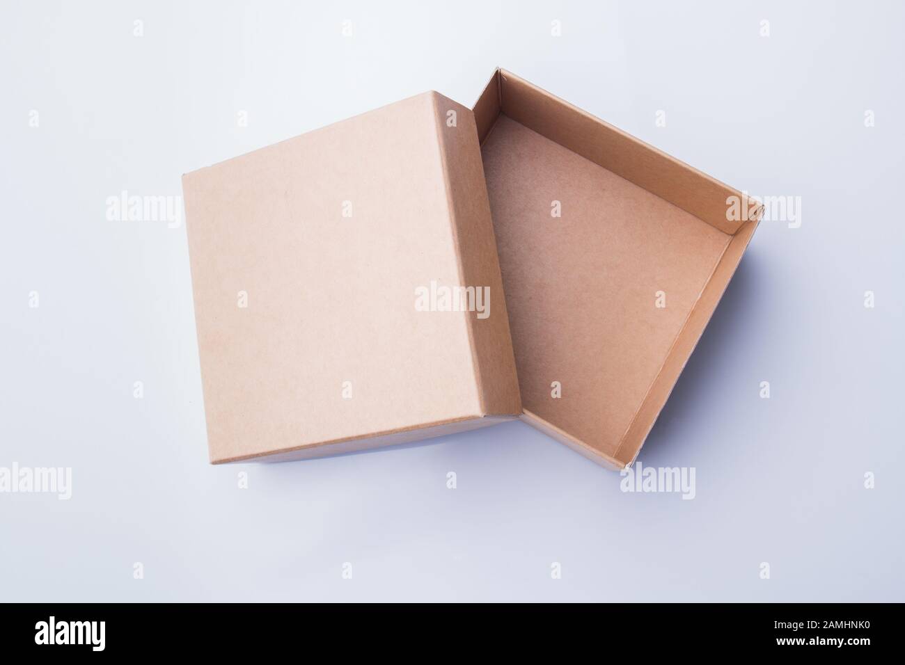 Uncovered empty two-piece cardboard box Stock Photo - Alamy