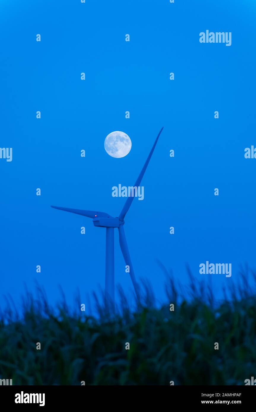 Moonrise over a lone wind turbine in Dexter Minnesota USA Stock Photo ...