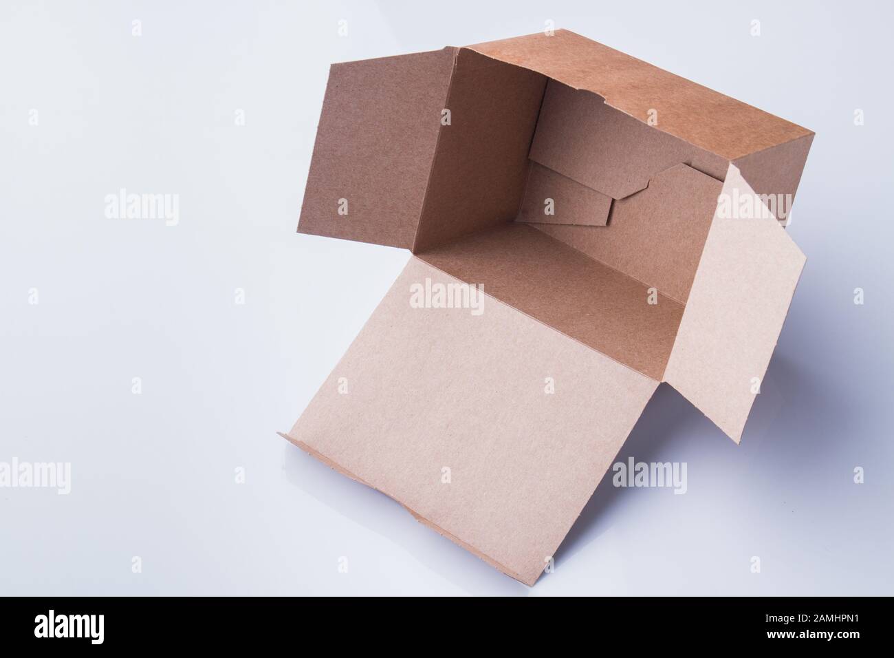 Opened cardboard box, angle view Stock Photo - Alamy