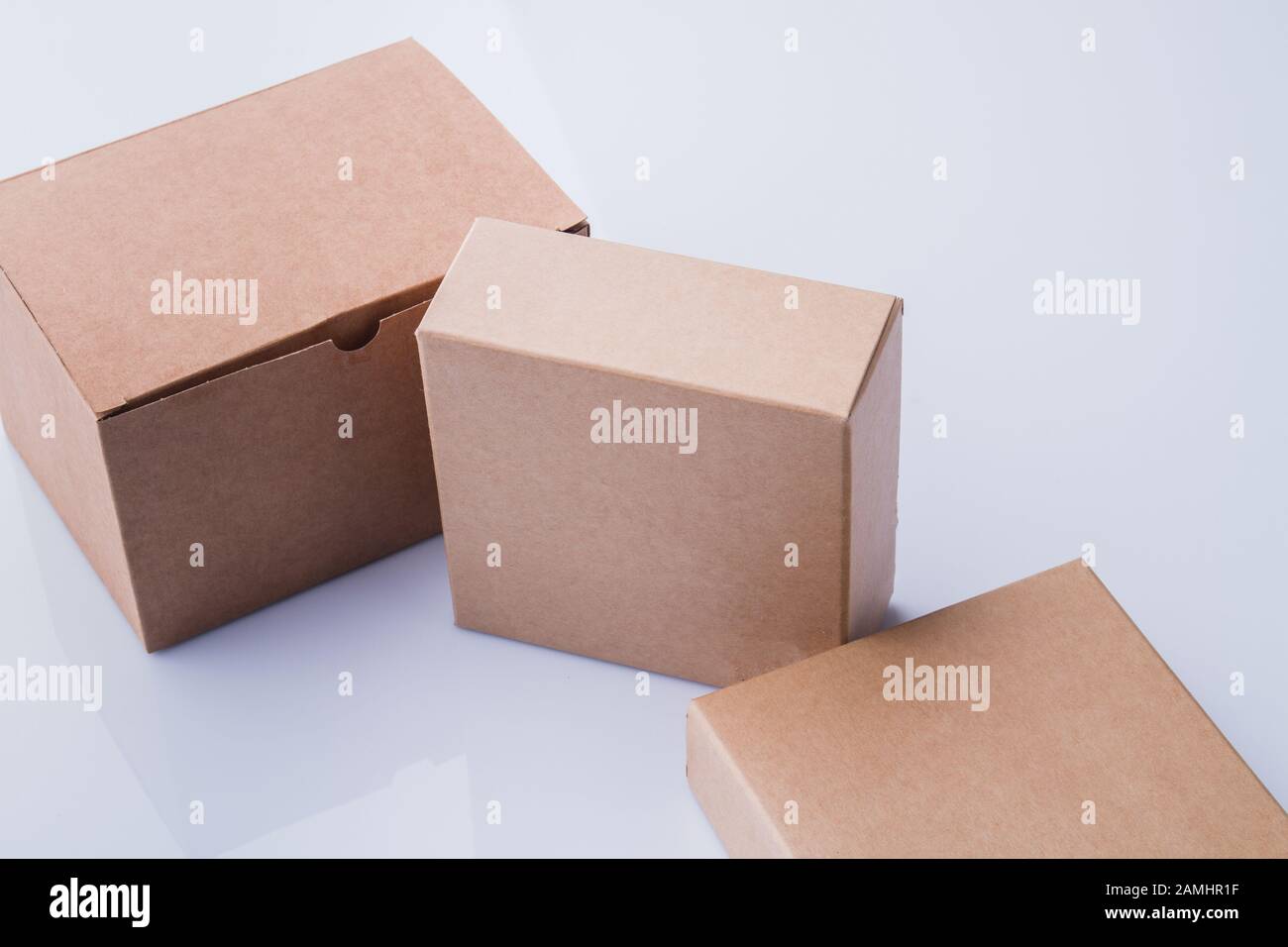 Three unpacked cardboard boxes Stock Photo - Alamy