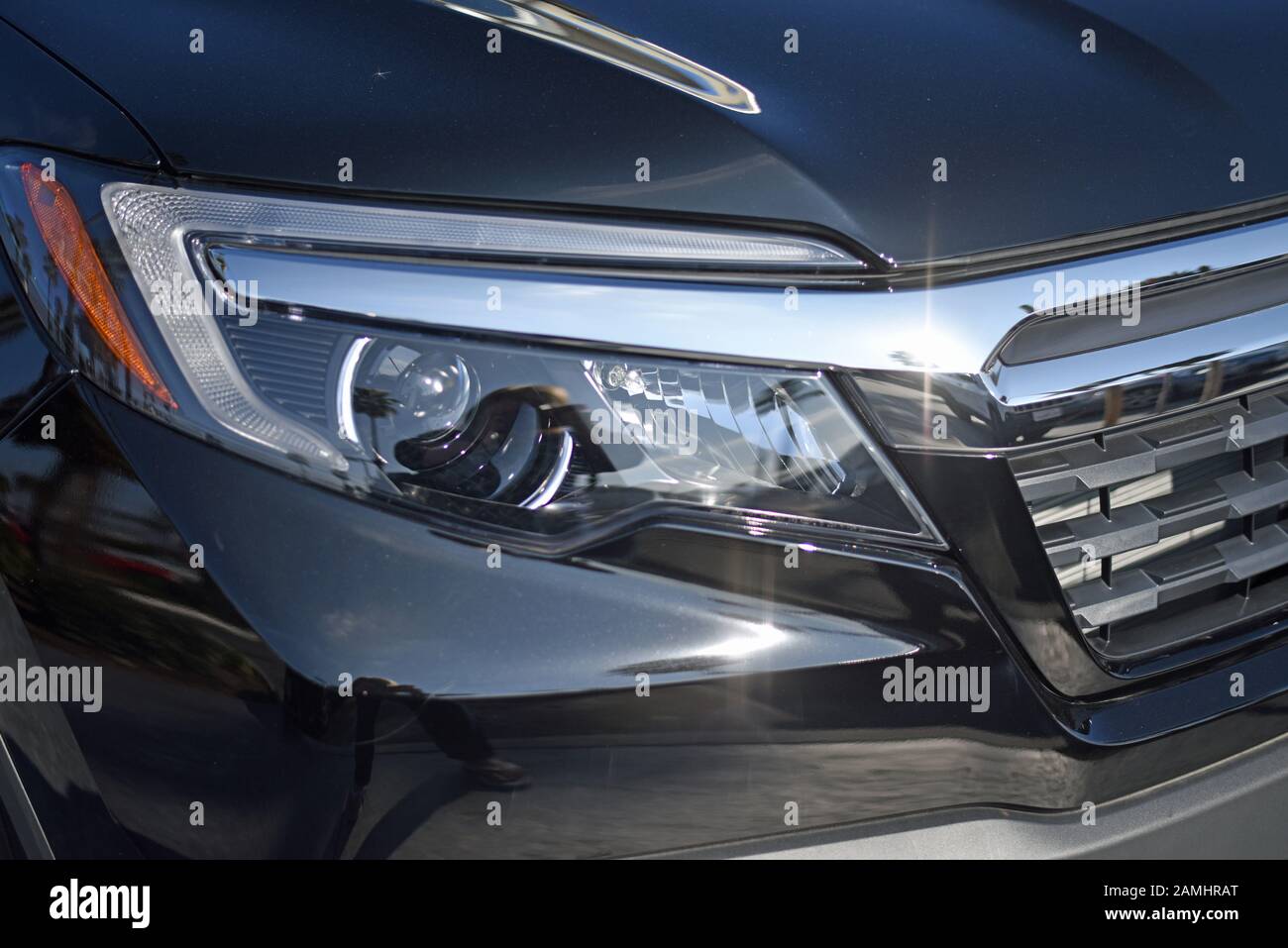 Black Car Headlight Stock Photo - Alamy