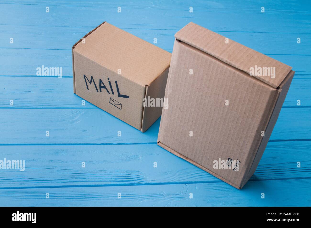 Cardboard mail carton packing boxes Stock Photo - Alamy
