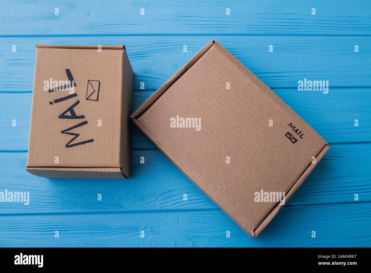 Two cardboard mail boxes, flat lay Stock Photo - Alamy