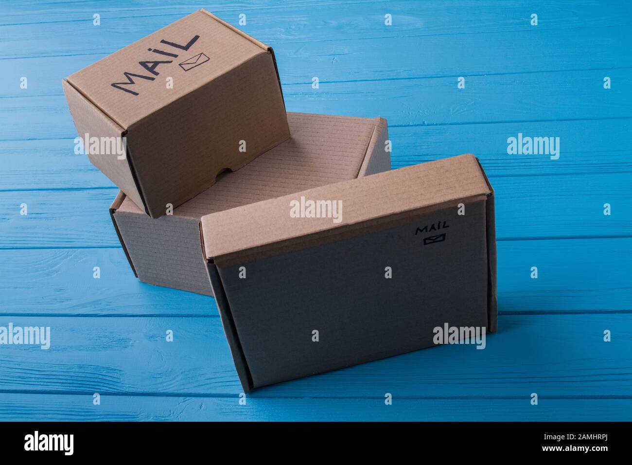 Three unpacked cardboard mail boxes Stock Photo - Alamy