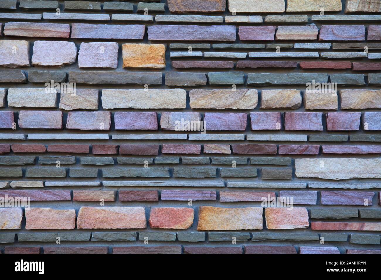 Multy-colored (colorful) decorative stone wall, texture, background ...